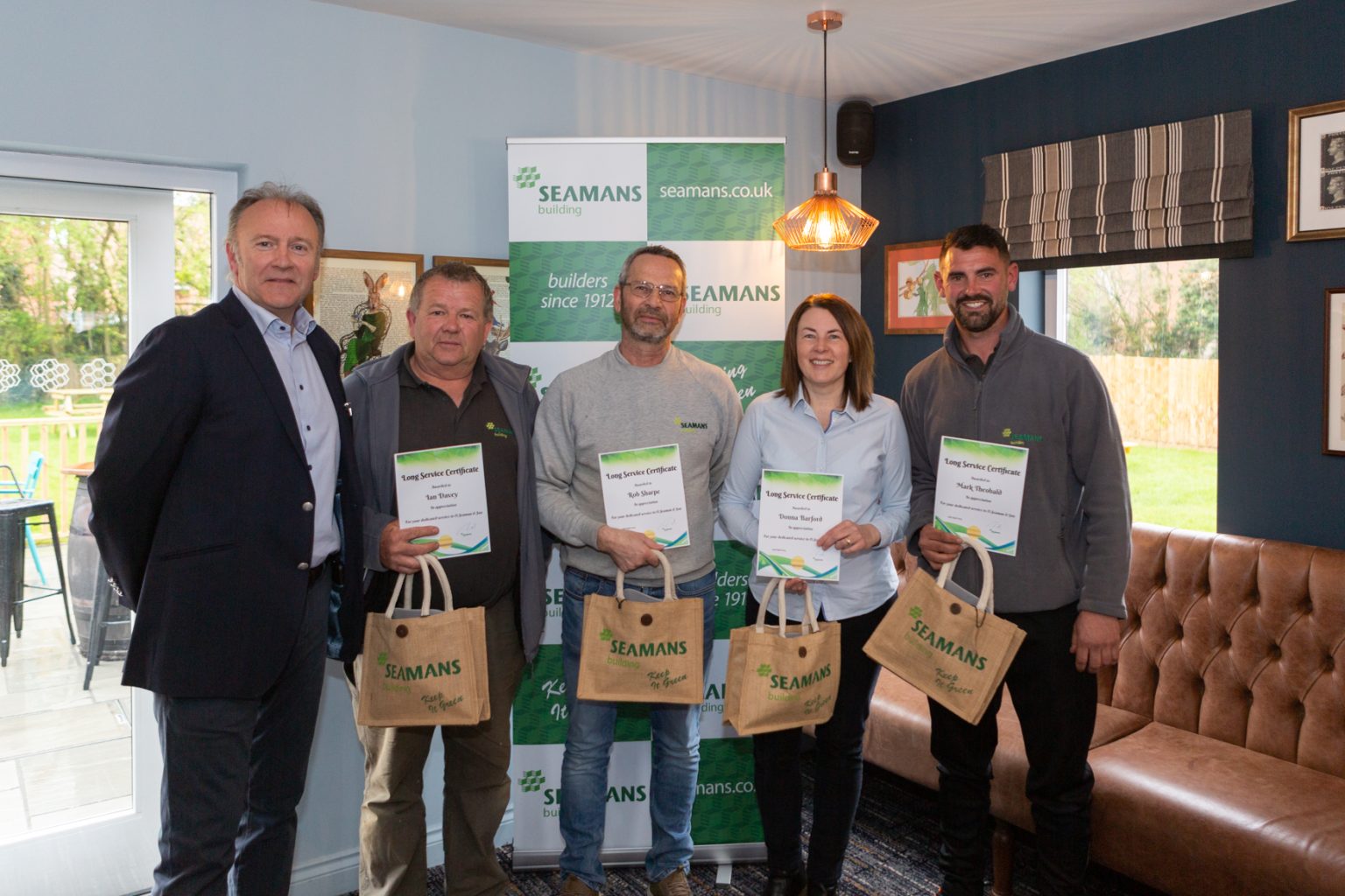 Long-serving employees celebrated at Seamans Building awards | Seamans ...